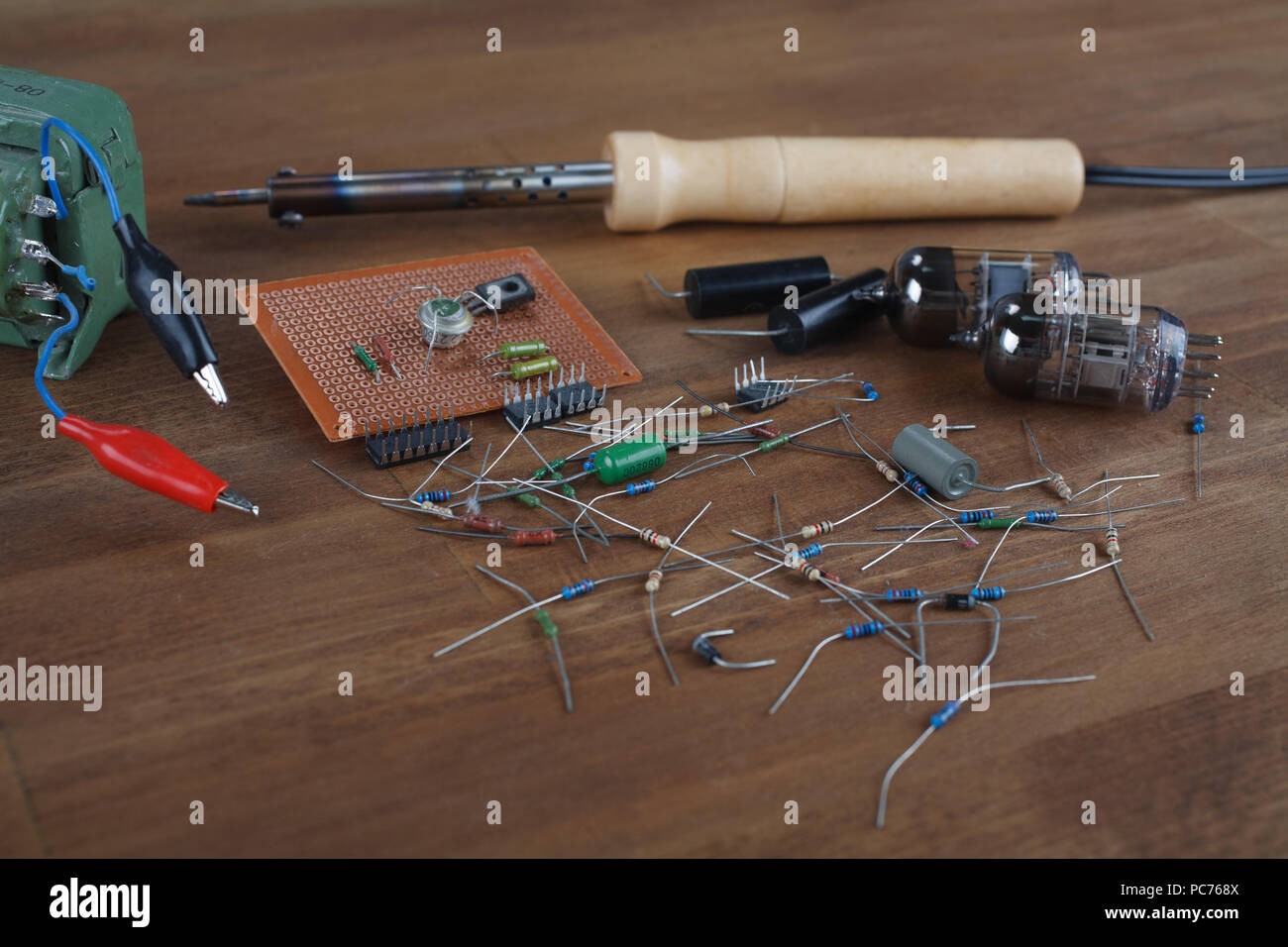 soldering iron - do it yourself concept with vintage retro electronic ...
