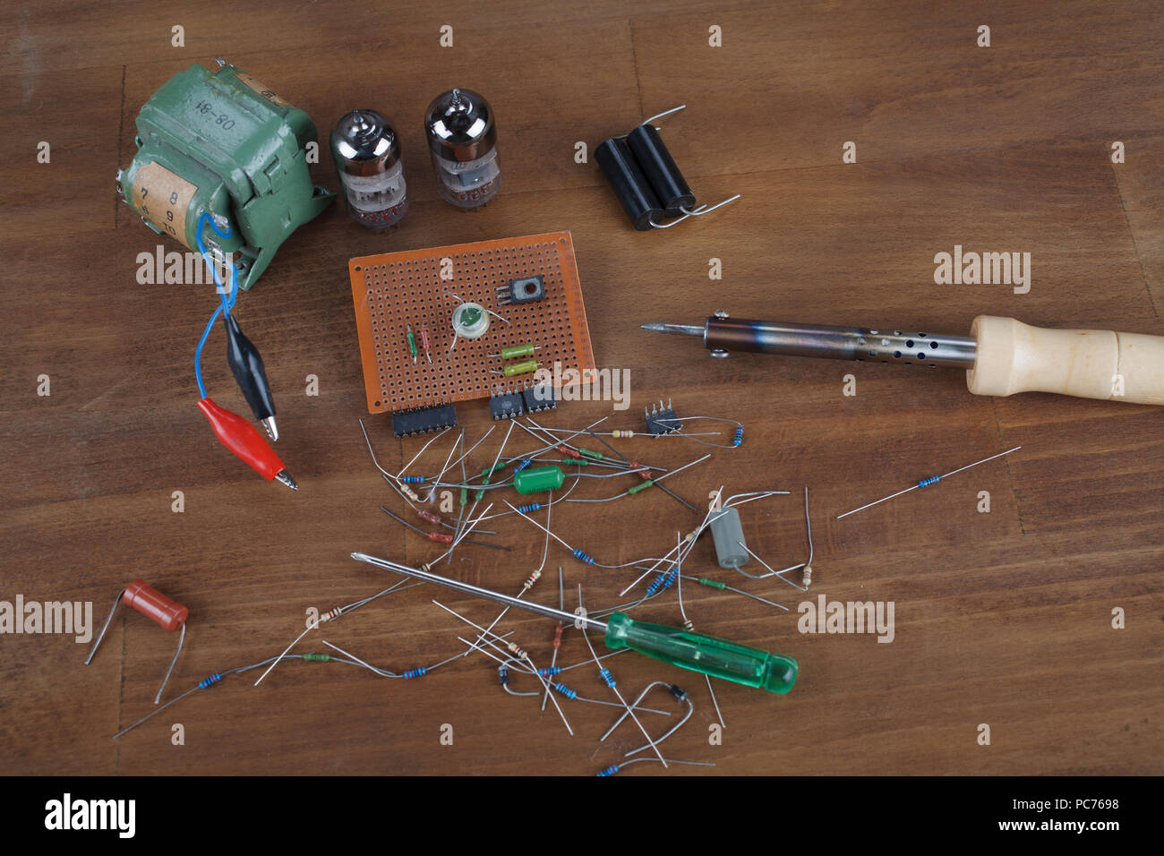 soldering iron - do it yourself concept with vintage retro electronic ...
