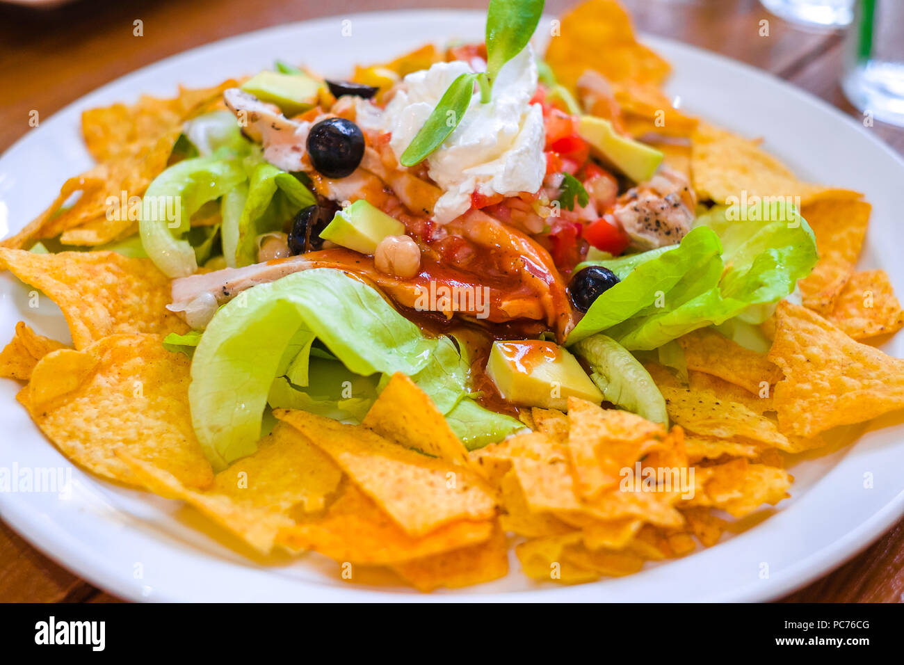 Traditional Mexican style vegetable salad with nacho Stock Photo - Alamy