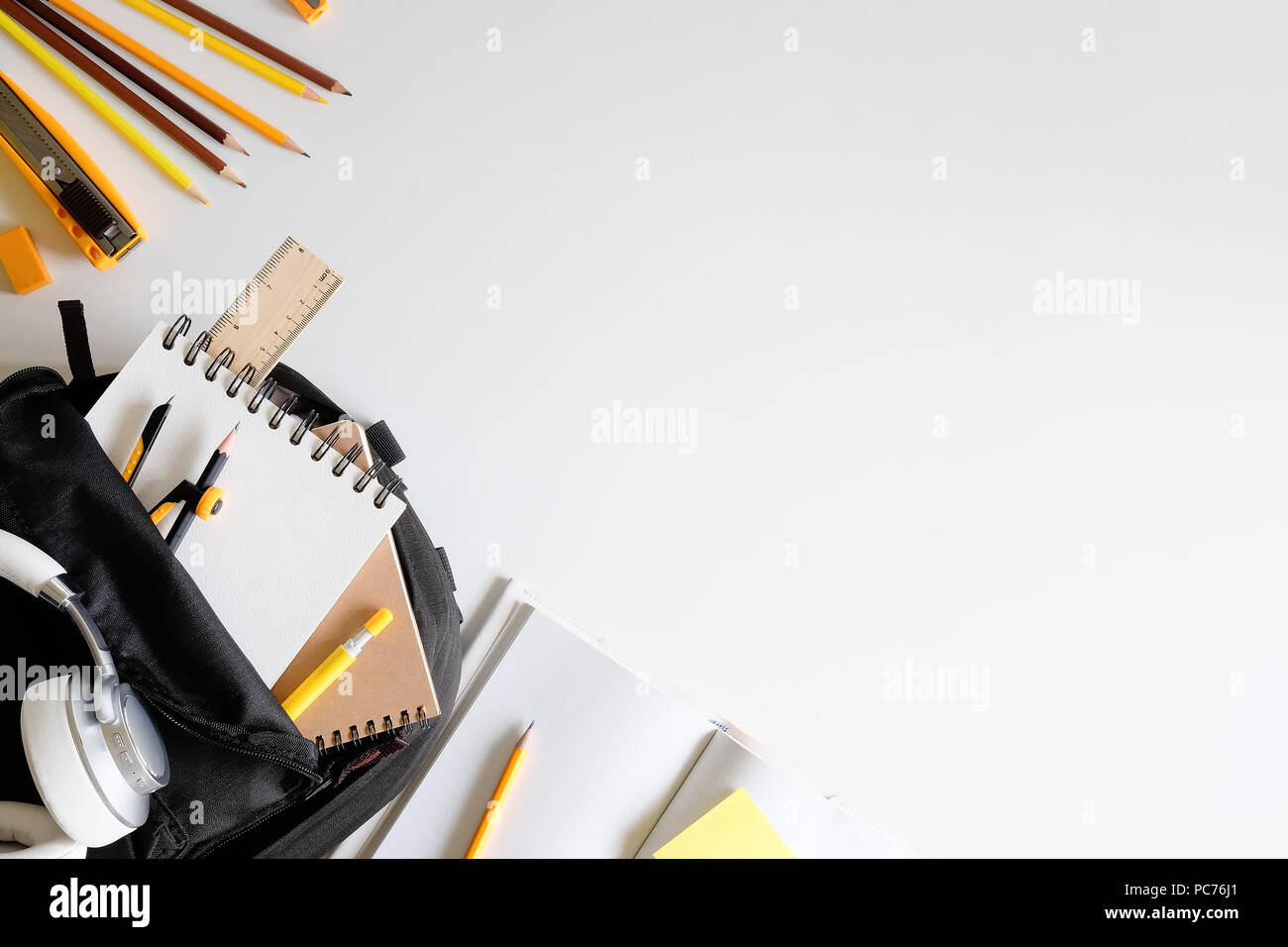 Back to school. Items for the school supplies on white table ready for ...