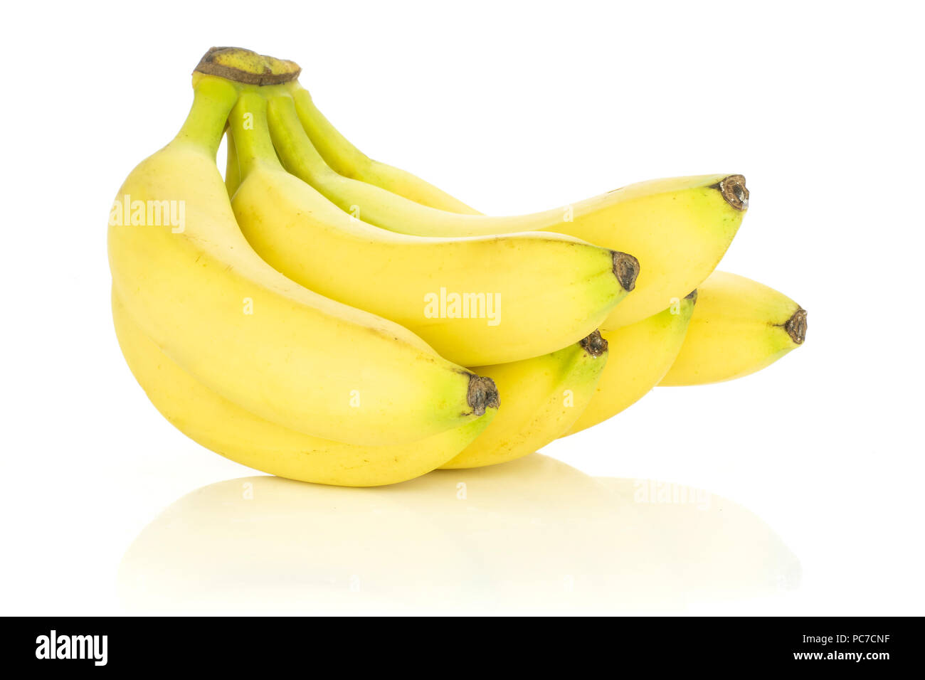 Group of six whole fresh yellow banana one cluster flatlay isolated on ...