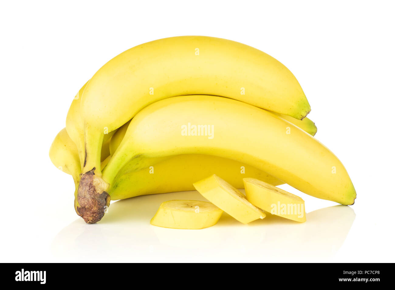 Group of six whole three slices of fresh yellow banana one cluster ...