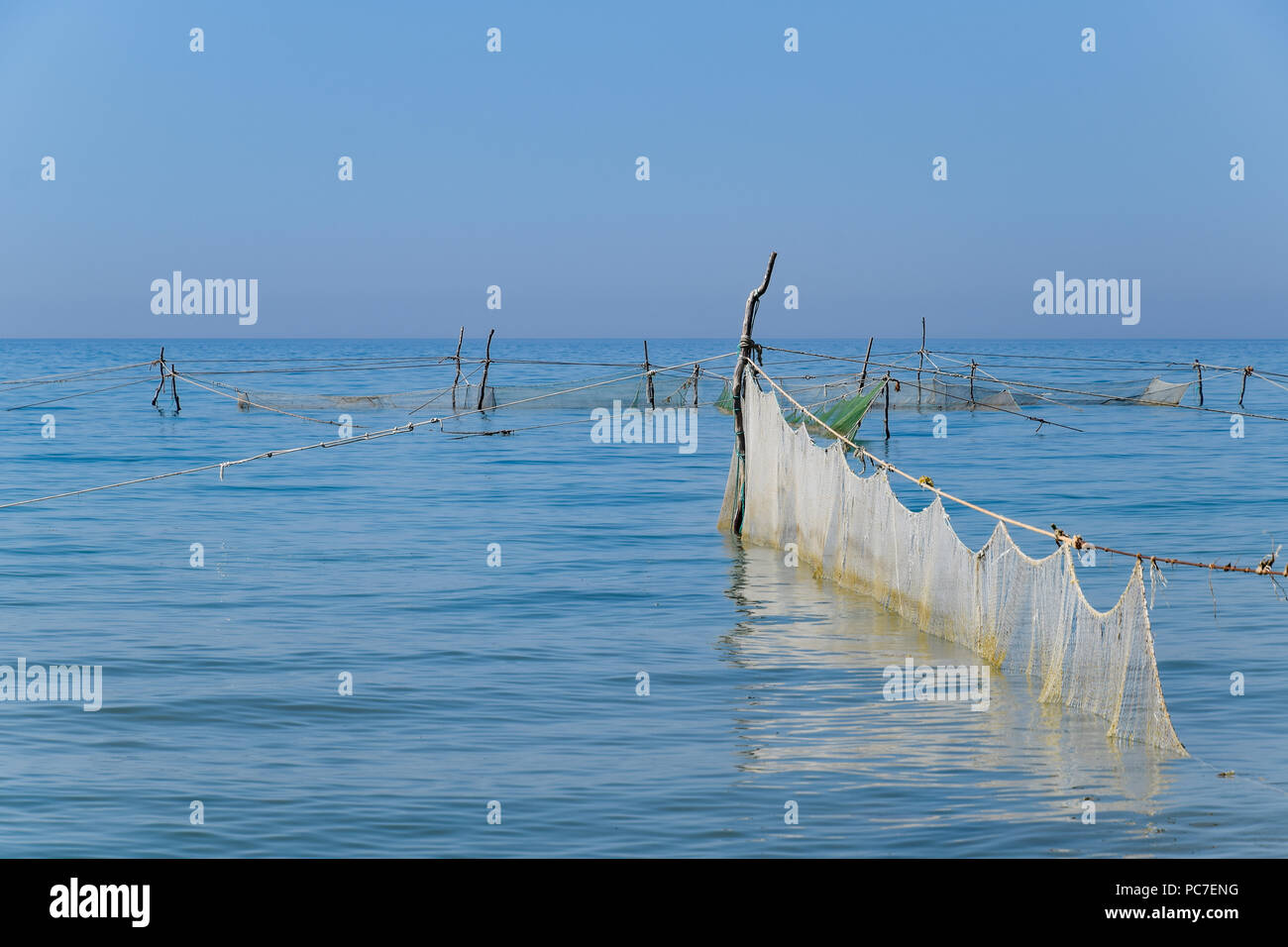 Fishing nets set in the sea. Fishing nets Stock Photo - Alamy