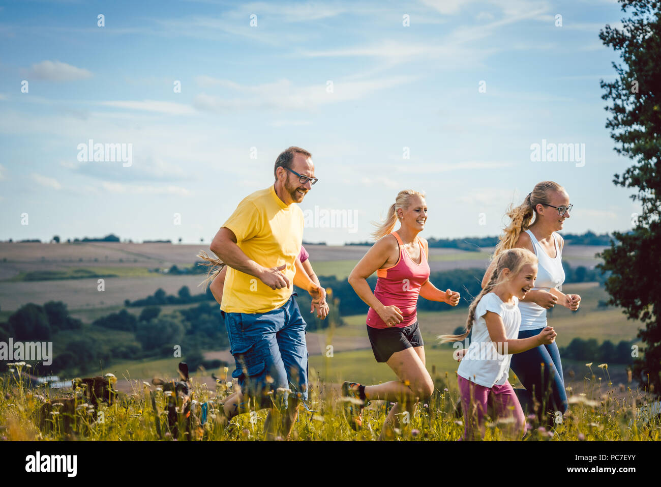 Family, mother, father and kids running for sport Stock Photo - Alamy