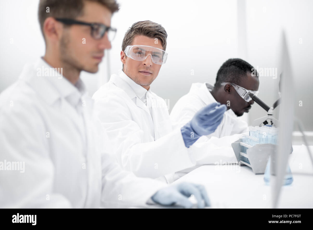 group of scientists are discussing new achievements Stock Photo - Alamy