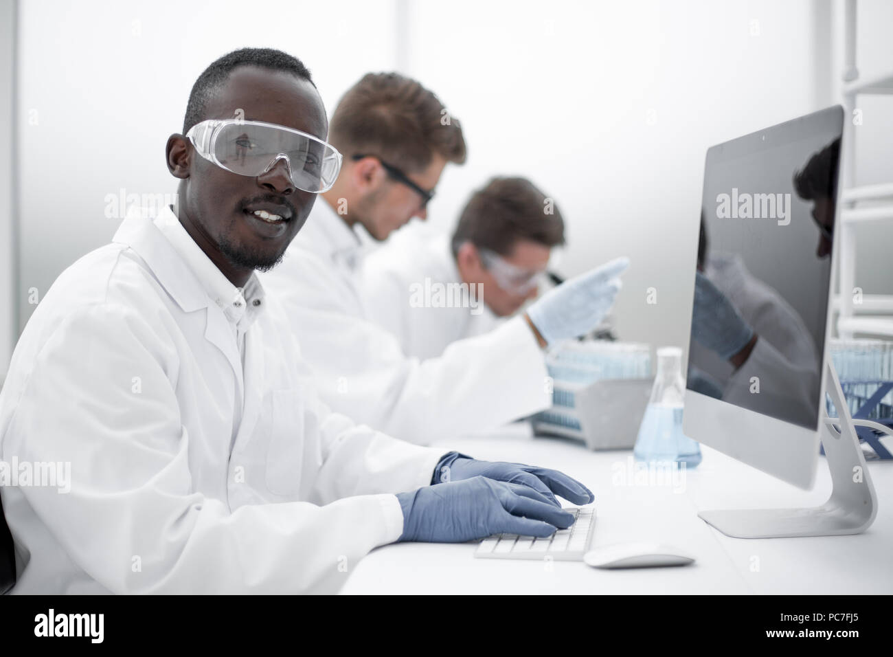 background image of a group of scientists at the laboratory table Stock ...