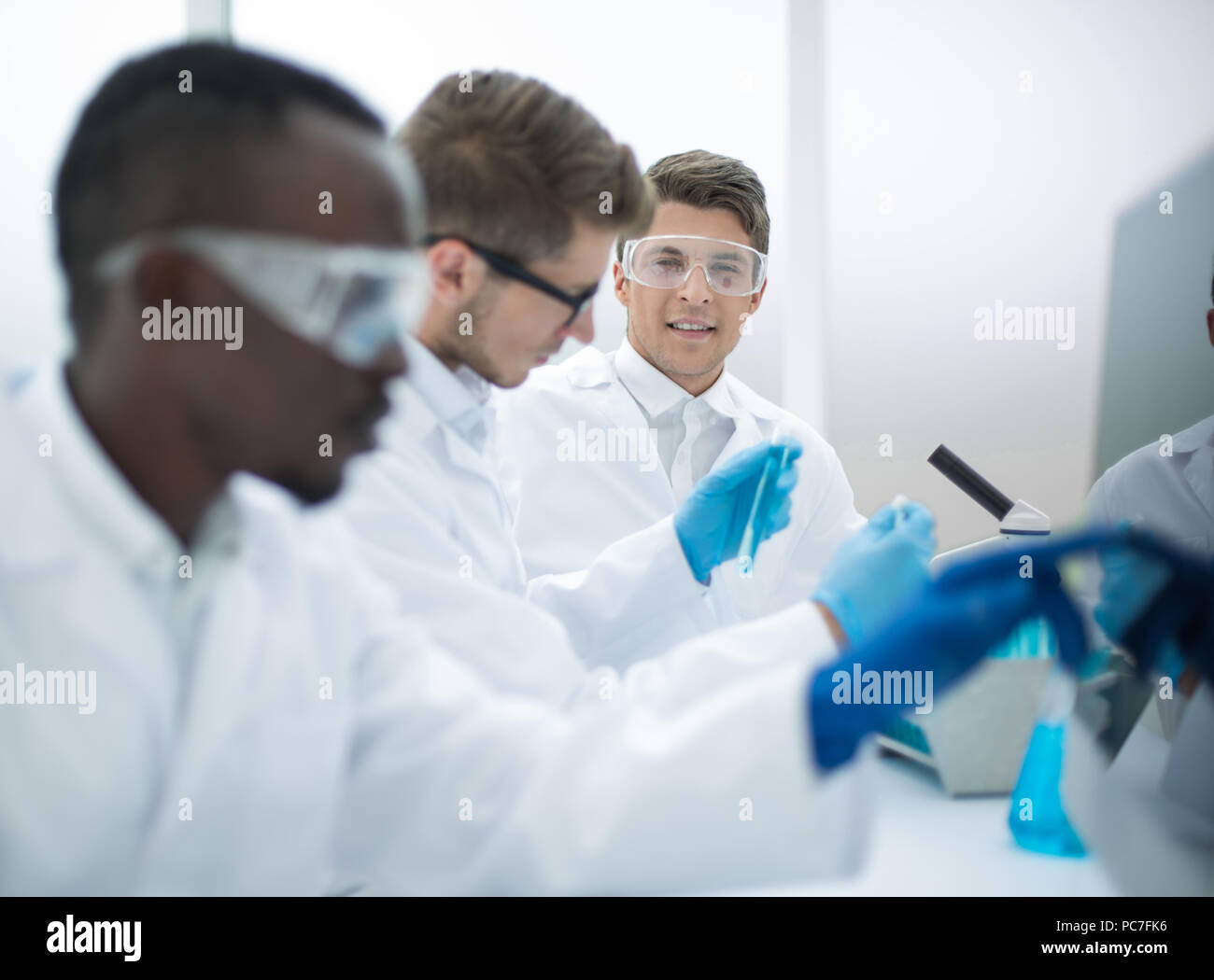 Group young successful scientists hi-res stock photography and images ...