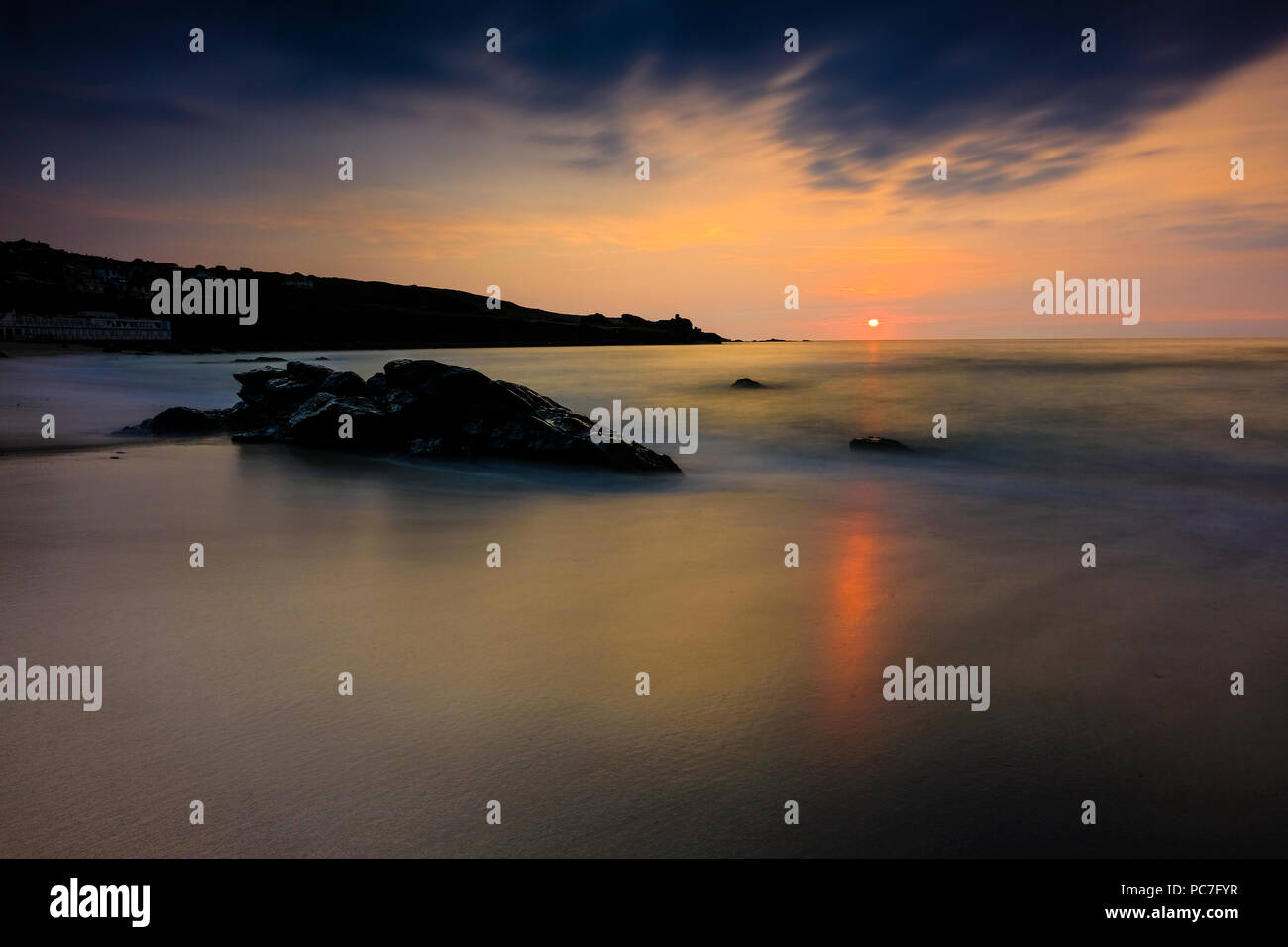 Sunset on The Cornwall Coast at St Ives on Porthmeor Beach Stock Photo ...