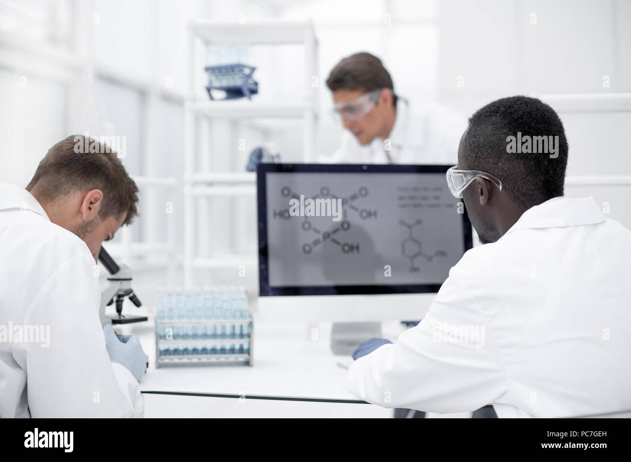 Microscope lab ethnic hi-res stock photography and images - Alamy