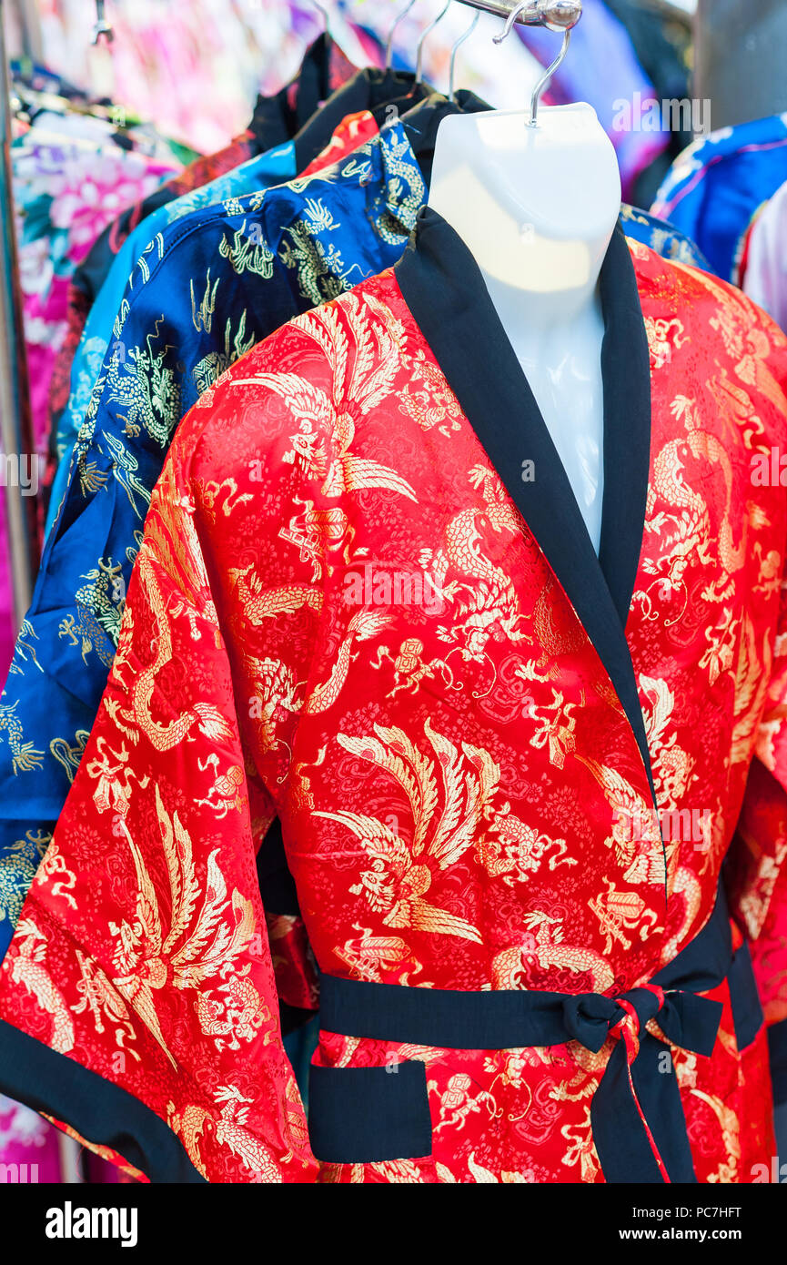 Sale of colorful kimonos on city street in Kyoto, Japan. Kimono is a ...