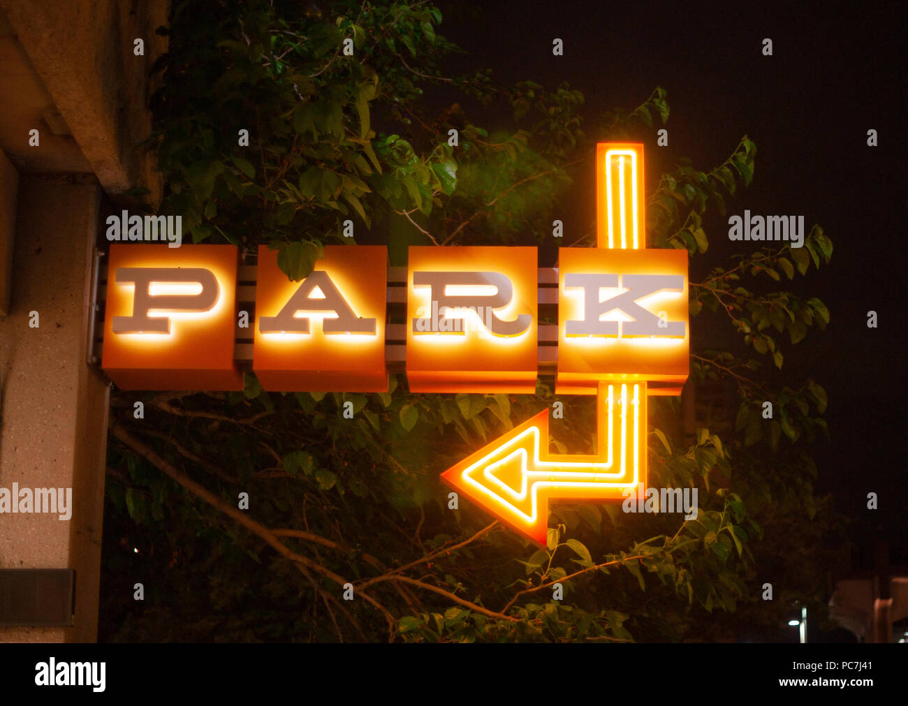 Sign neon parking arrow hi-res stock photography and images - Alamy