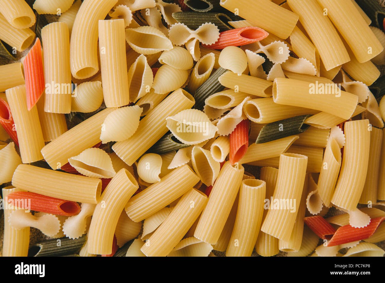 top view of various types of raw pasta Stock Photo - Alamy