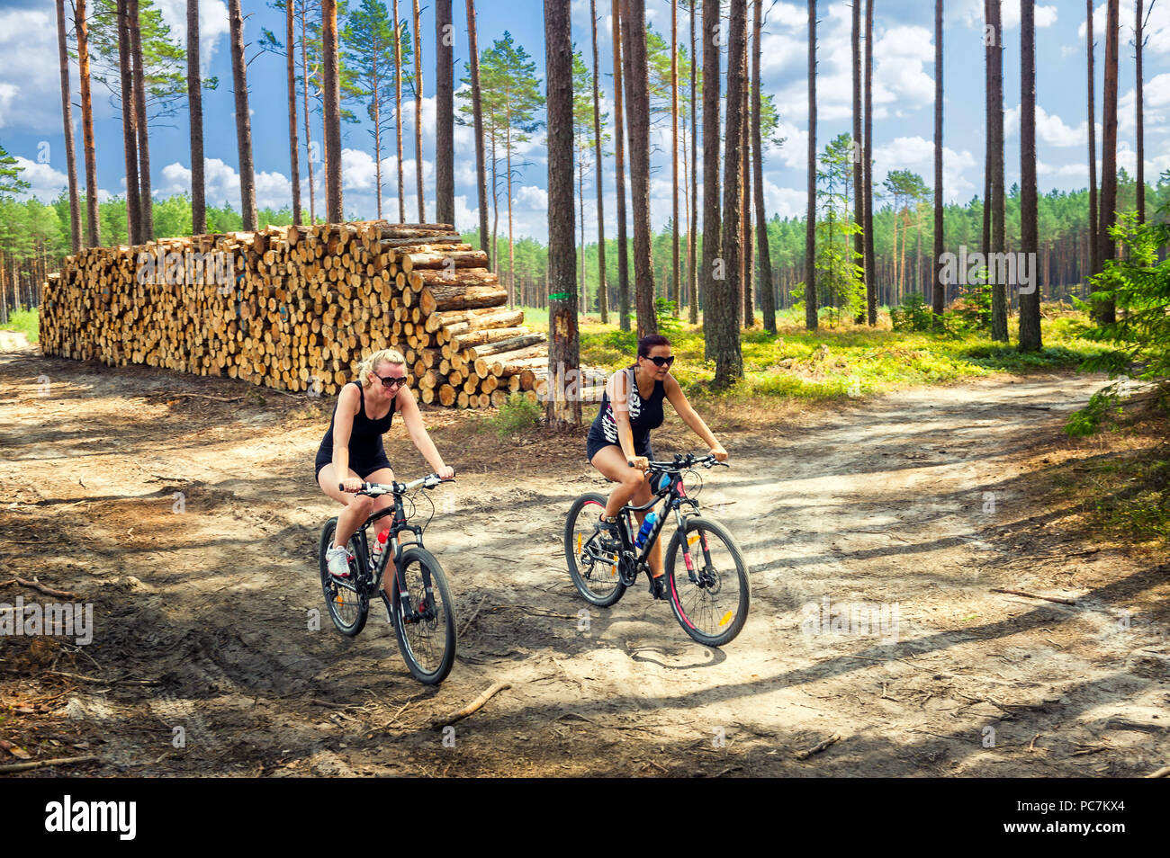 Three friends cycling hi-res stock photography and images - Alamy