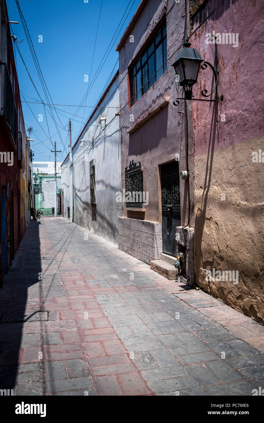 Narrow street on on a hot day, Queretaro City, Queretaro state ...
