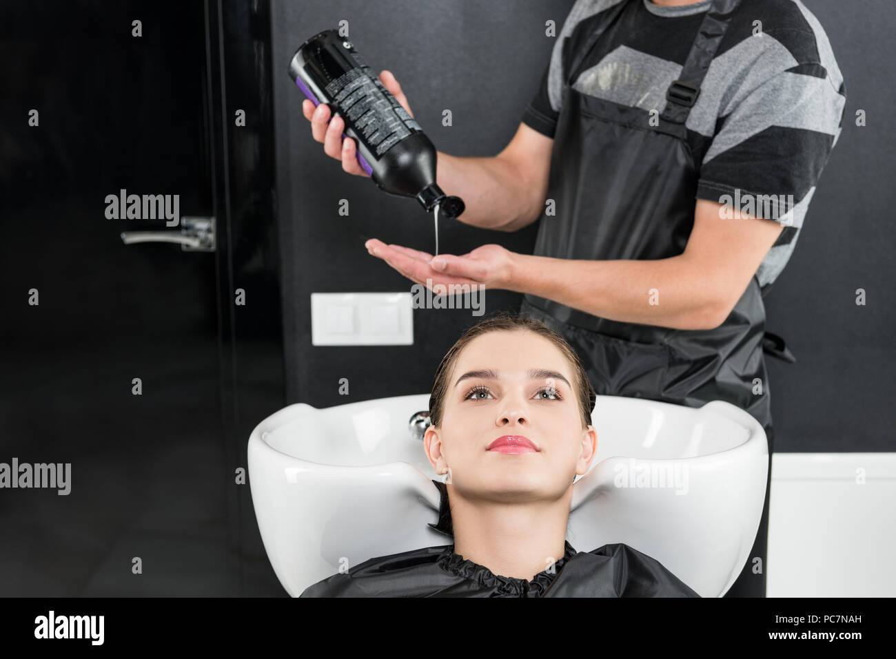 happy relaxed woman having hair wash in beauty salon Stock Photo - Alamy