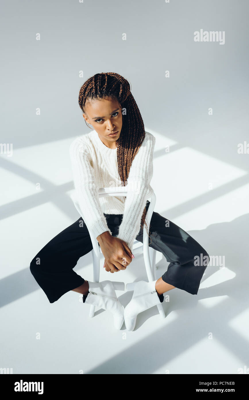 Girl Sitting Down In Chair