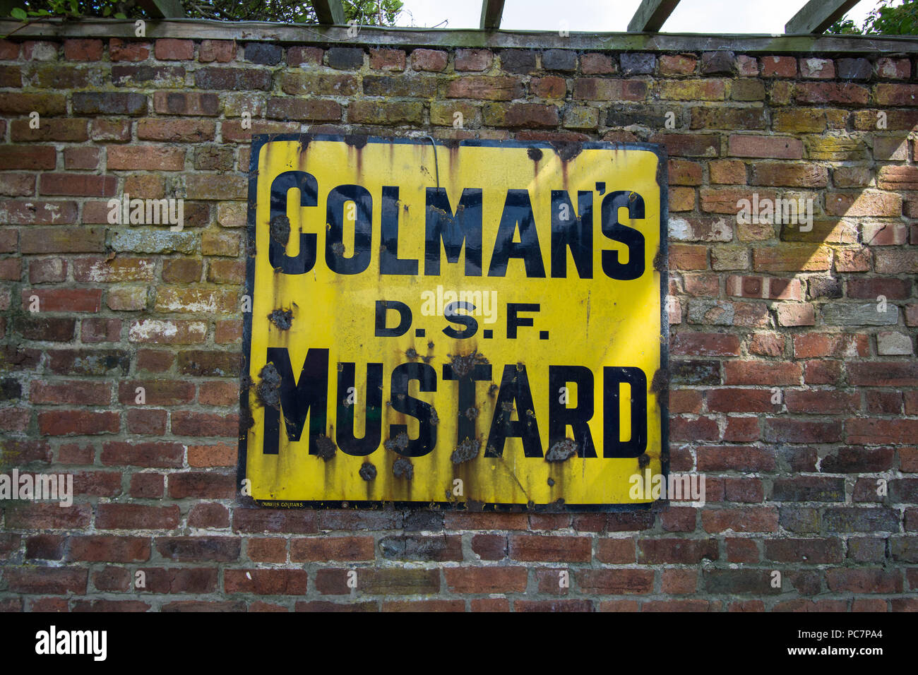 Colmans Mustard sign on wall old signs outside on brick wall yellow ...