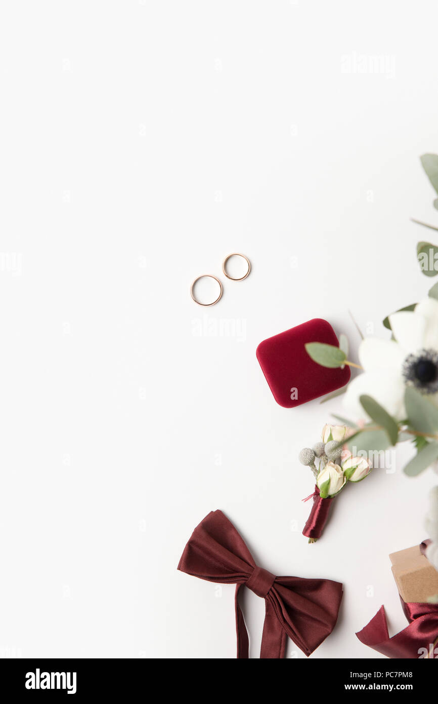 flat lay with gift, buttonhole, bow tie and jewelry box isolated on ...