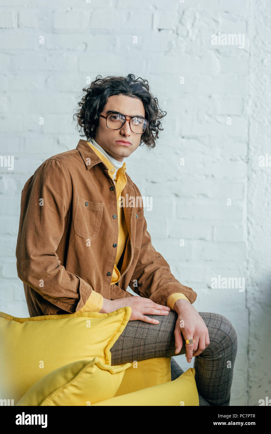 Portrait of male fashion model with eyeglasses Stock Photo - Alamy