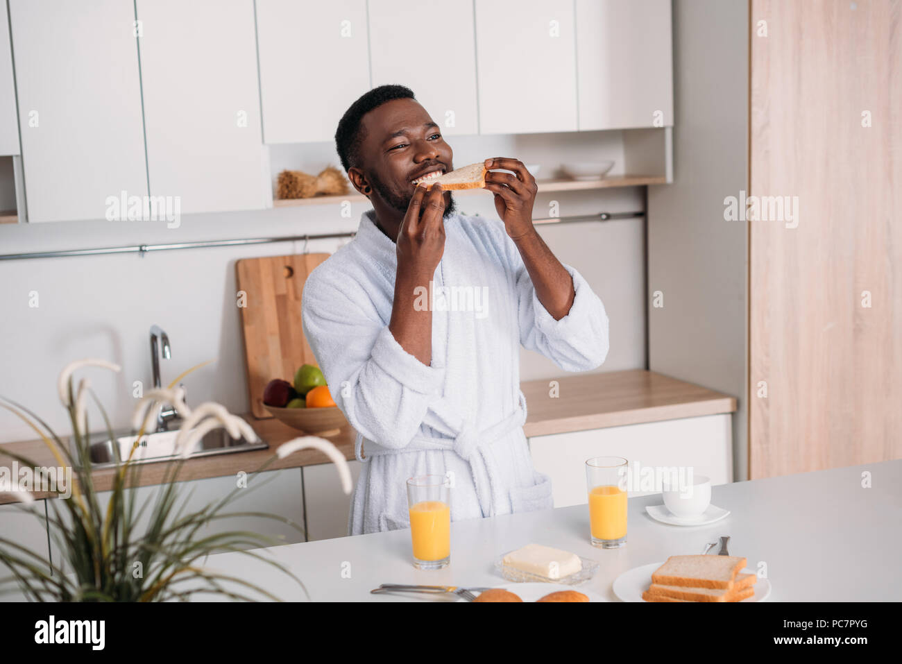 Man Eating Toast High Resolution Stock Photography and Images - Alamy