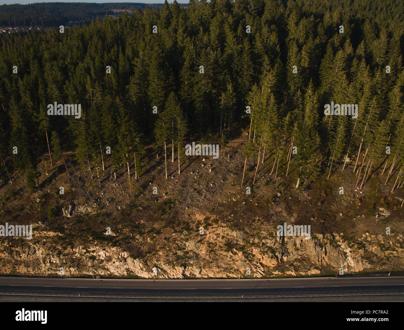Aerial view of magnificent landscape with forest and road, Germany ...