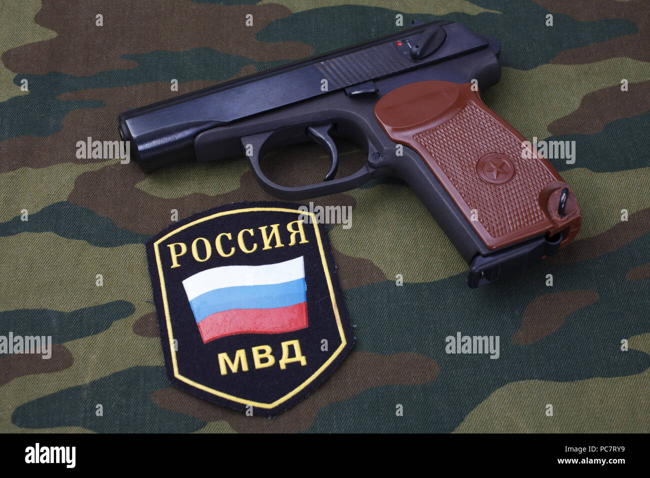 Sep. 21, 2017. Russian Police uniform badge with 9mm handgun Makarov on ...