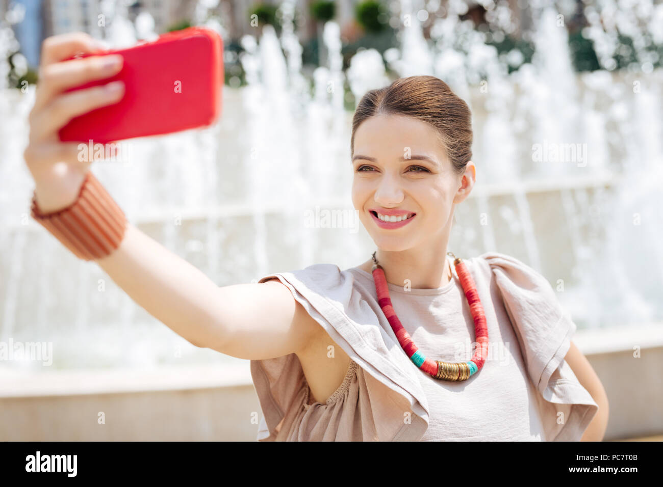 Positive attractive woman smiling Stock Photo - Alamy