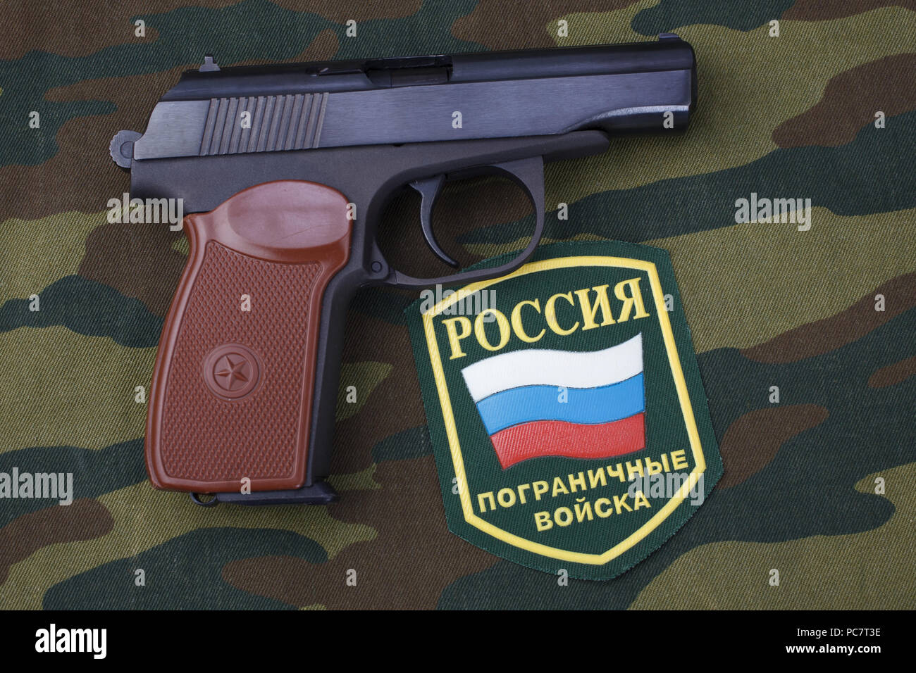Sep. 21, 2017. Russian border guards uniform badge with 9mm handgun ...