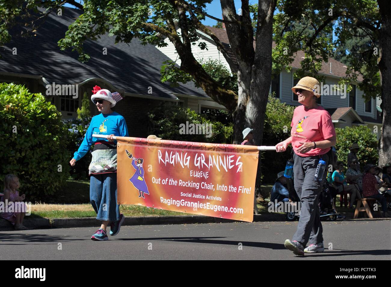 Two senior women representing the Raging Grannies, an activist group ...