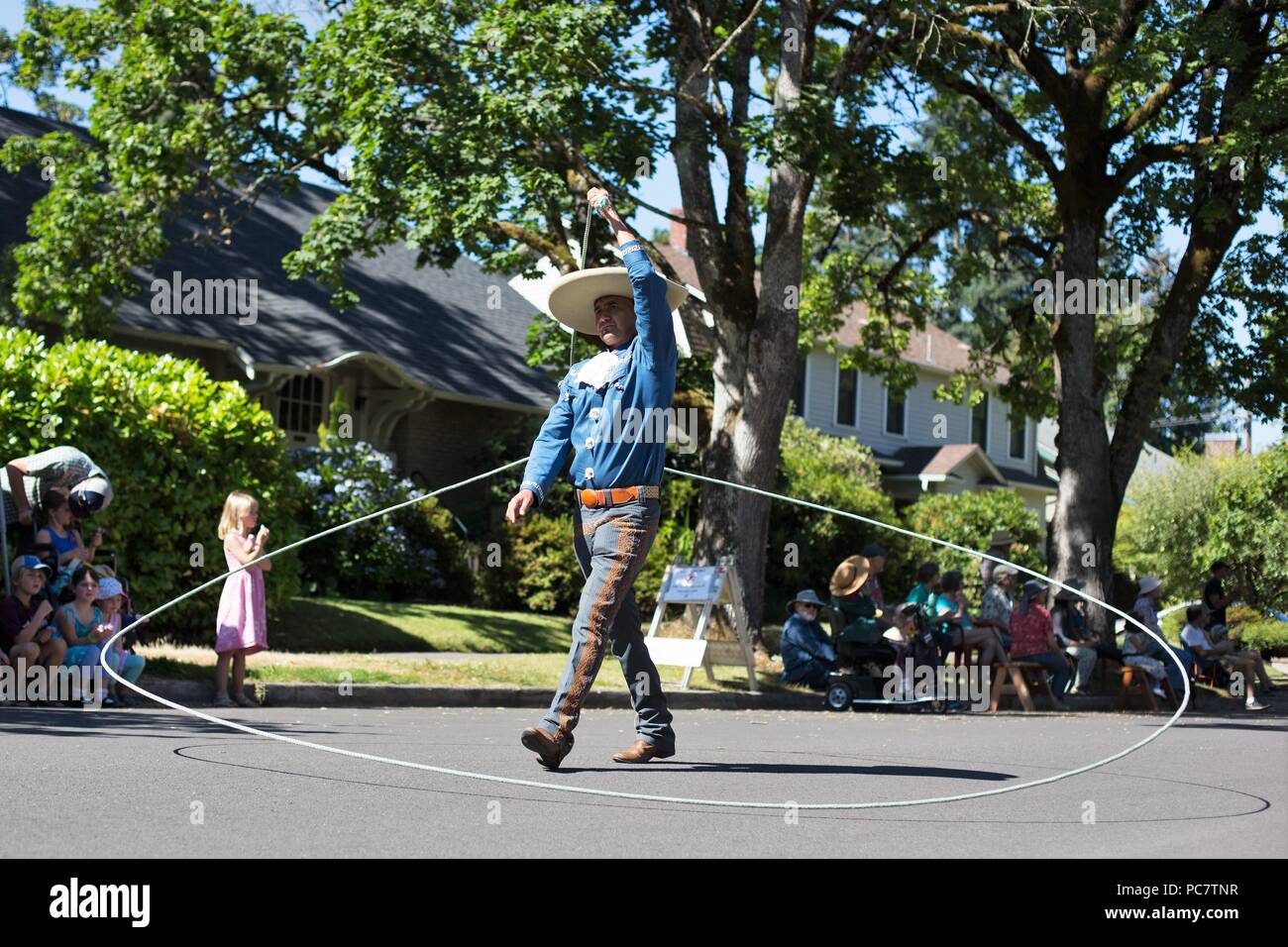 Man throwing rope hi-res stock photography and images - Alamy