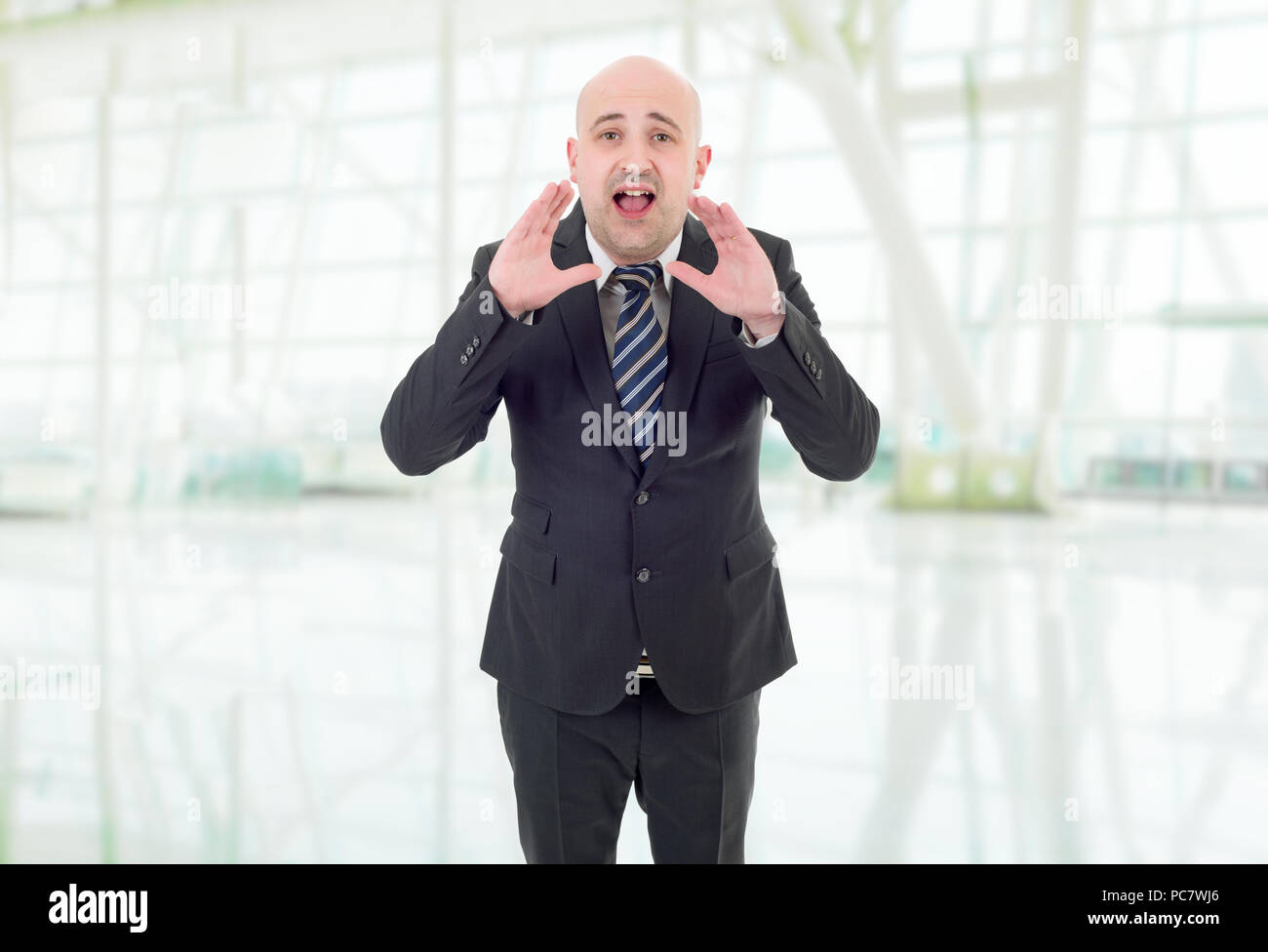 mad business man yelling at the office Stock Photo - Alamy