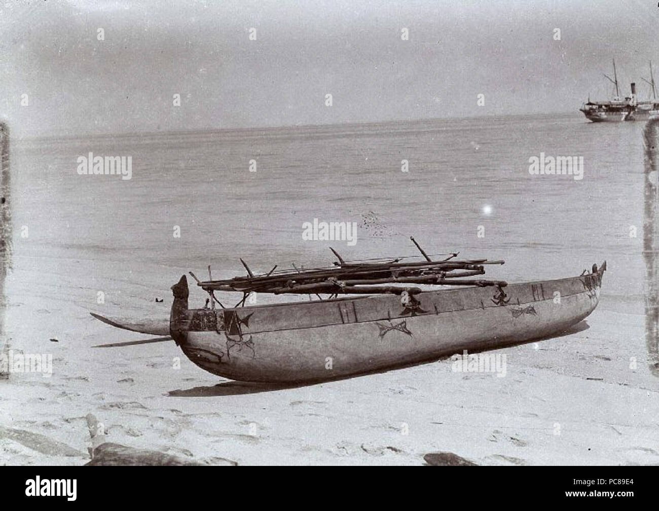 64 A proa on the beach and the expedition ship 'Zeemeeuw' on the roa ...