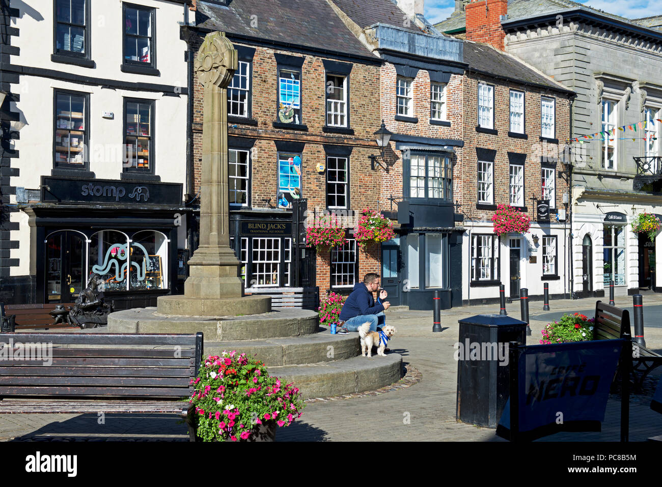 Man and dog, the Market Place, Knaresborough, North Yorkshire, England ...
