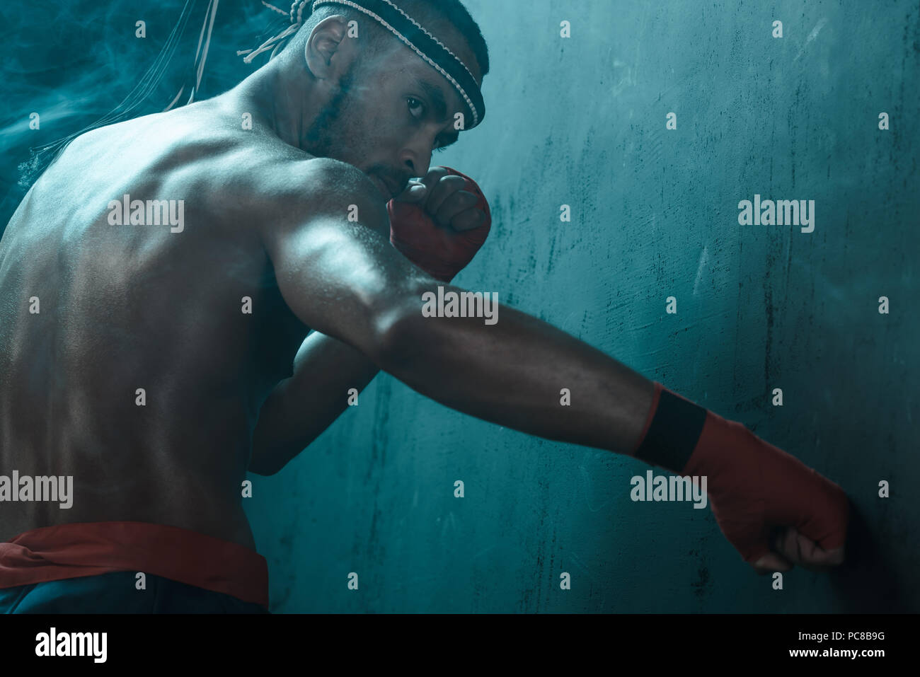 Muay Thai athlete training at Thai boxing indoors, ultimate fight ...