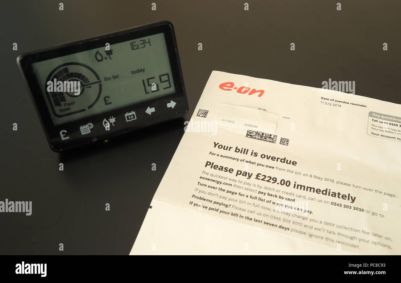 A smart meter next to an energy bill Stock Photo - Alamy