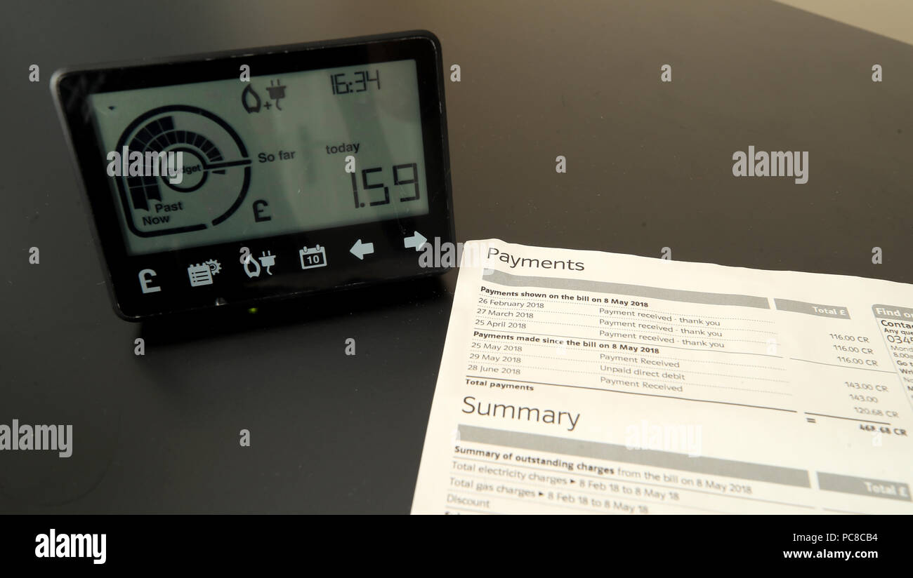 A smart meter next to an energy bill Stock Photo - Alamy