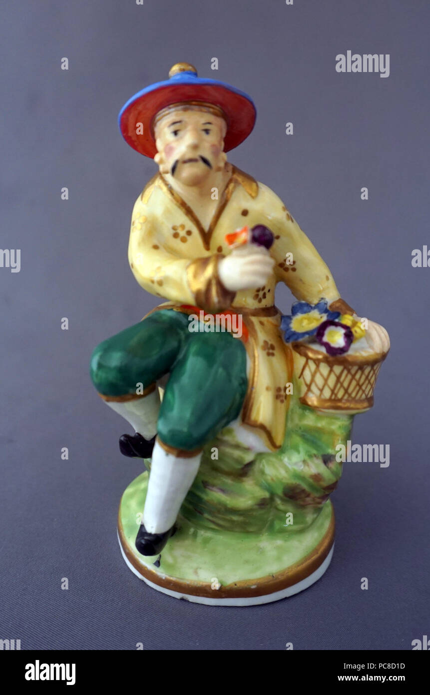 Antique Porcelain 19C figure of an Oriental Chinese Man Stock Photo - Alamy