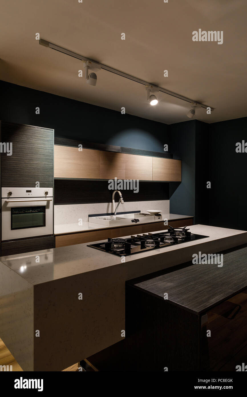 Interior of modern kitchen with stove on counter Stock Photo - Alamy