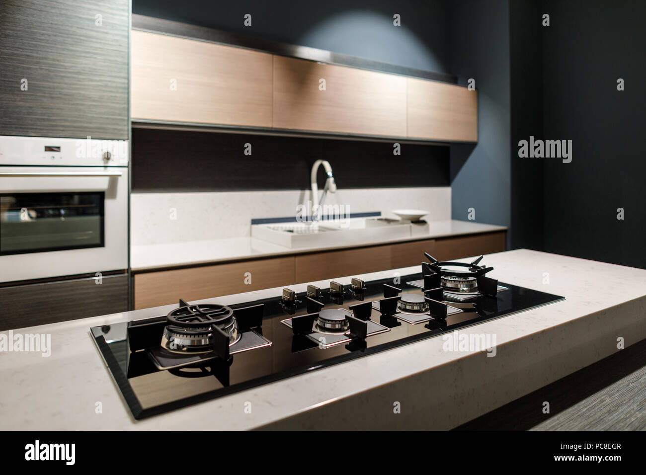 Interior of modern kitchen with metal stove Stock Photo - Alamy