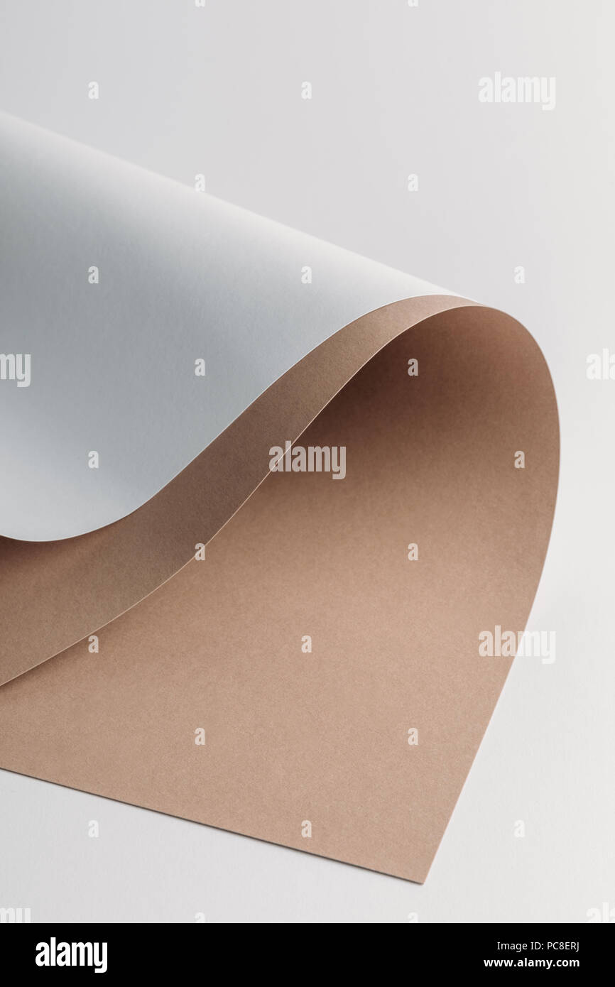 decorative white and brown paper sheets on grey background Stock Photo ...