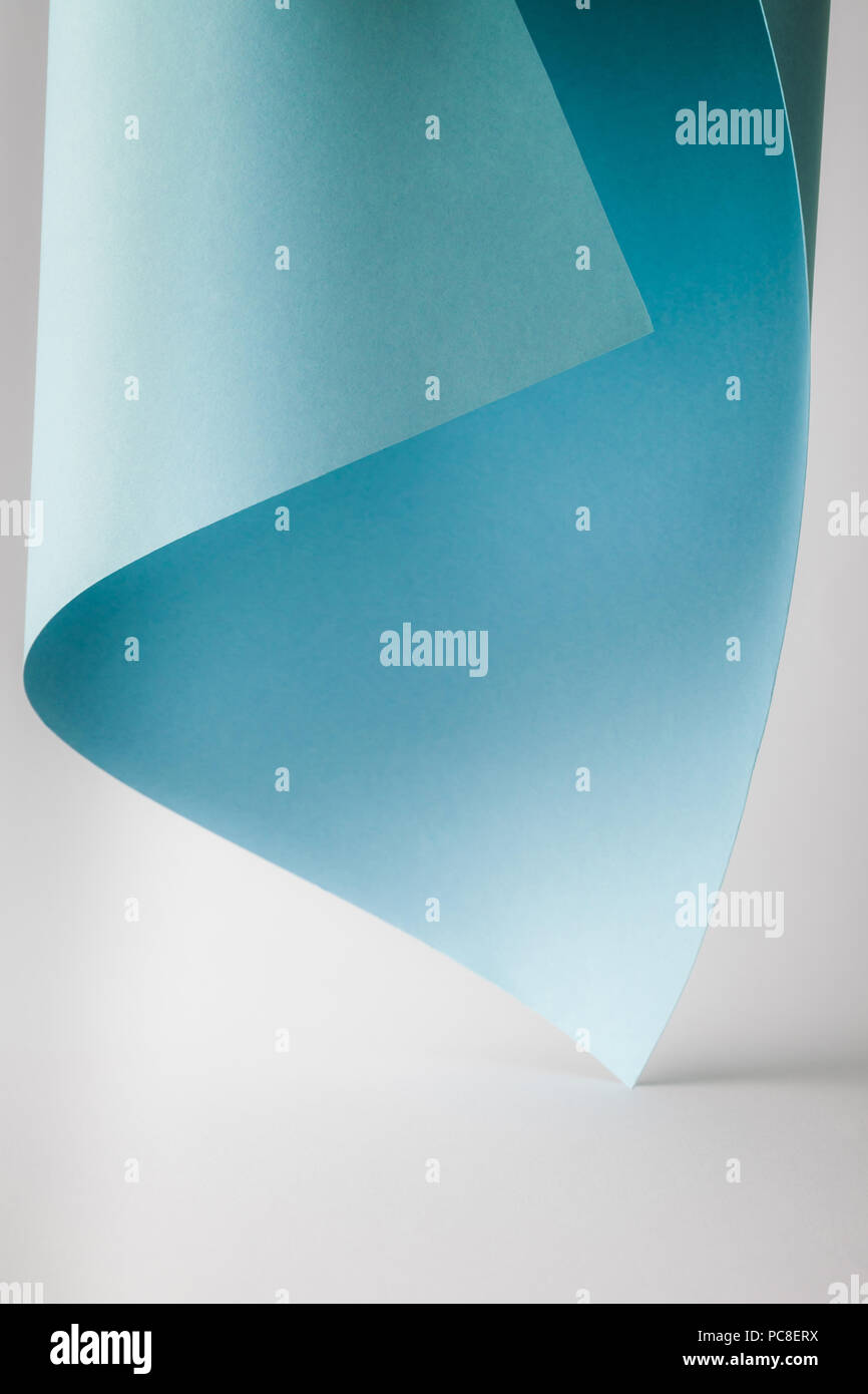 beautiful blue paper sheet on grey background Stock Photo - Alamy