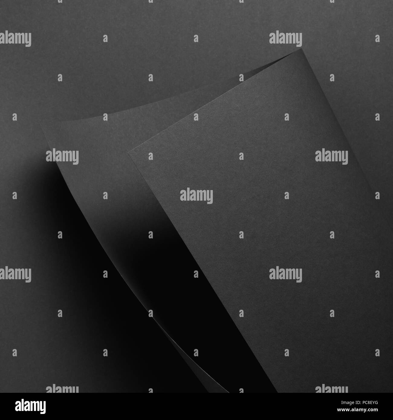 close-up view of grey paper sheet and dark background Stock Photo - Alamy
