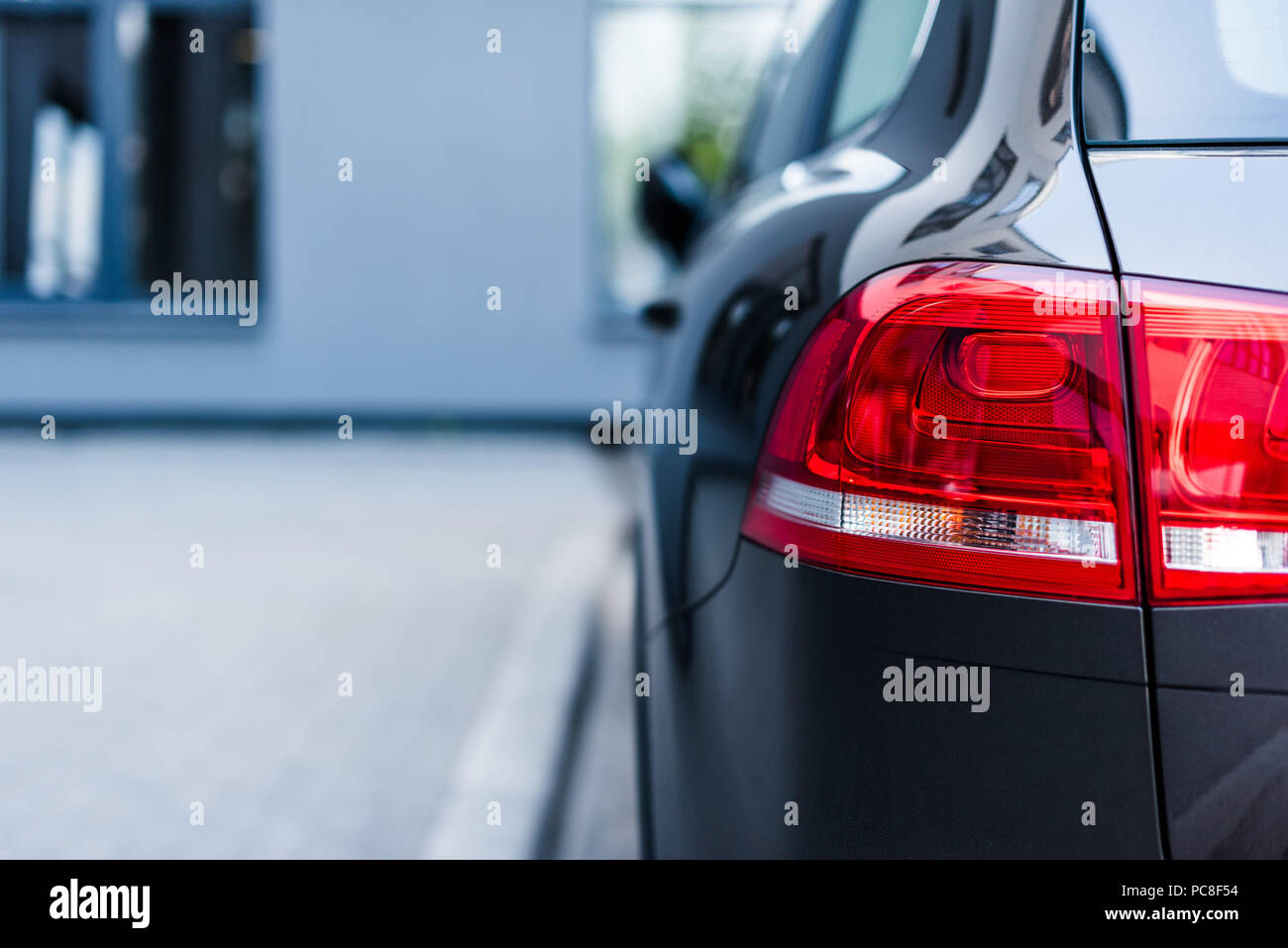 Red brake lights of car on street Stock Photo - Alamy