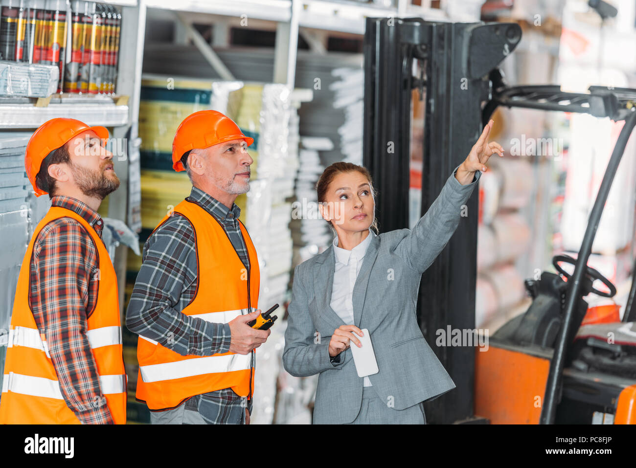 Female workers in hardhats hi-res stock photography and images - Alamy