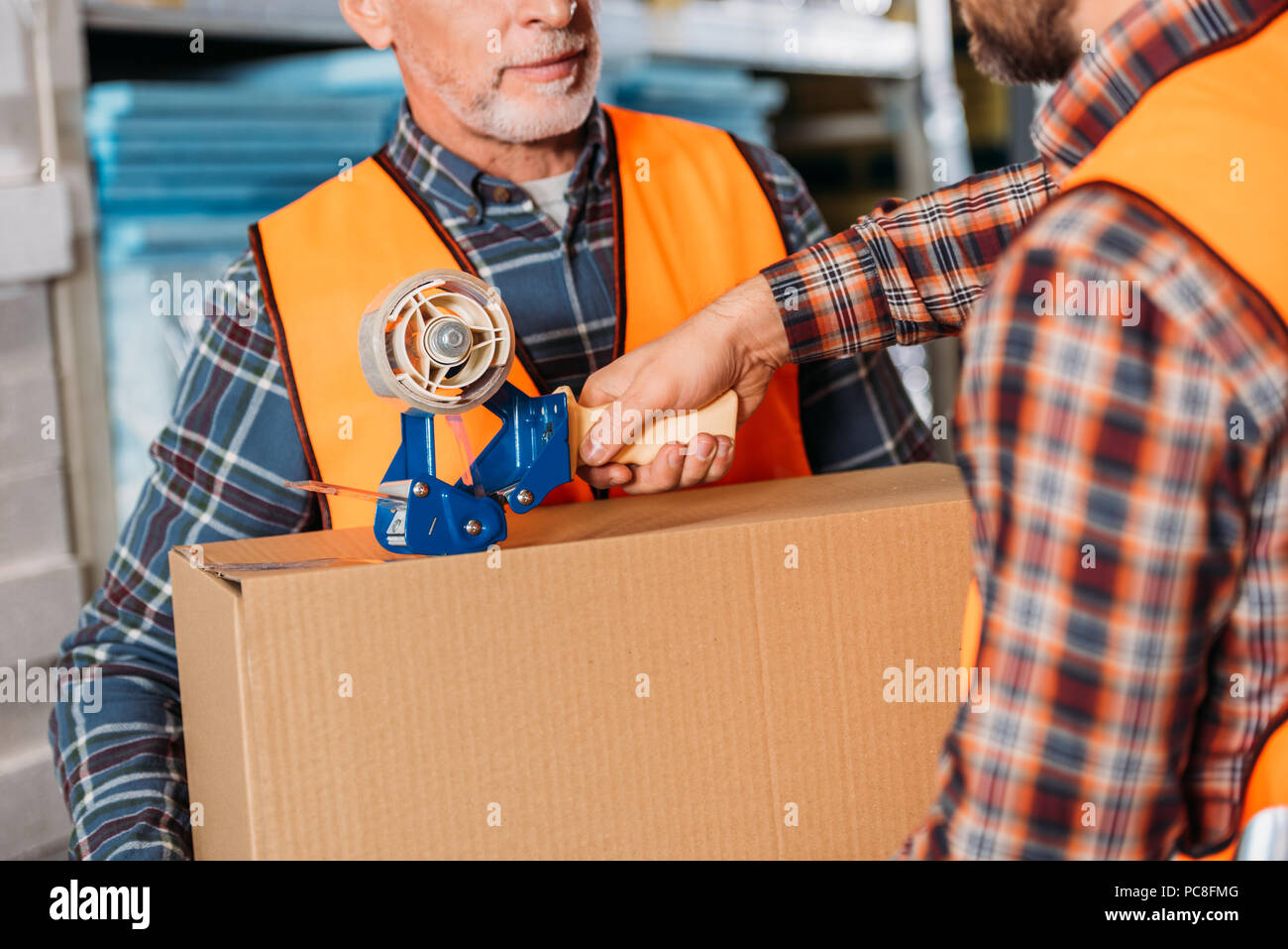 Men packing in warehouse hi-res stock photography and images - Alamy