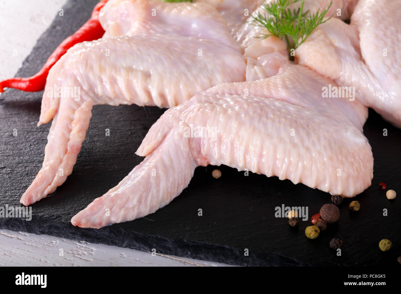 Raw chicken wings for cooking Stock Photo - Alamy