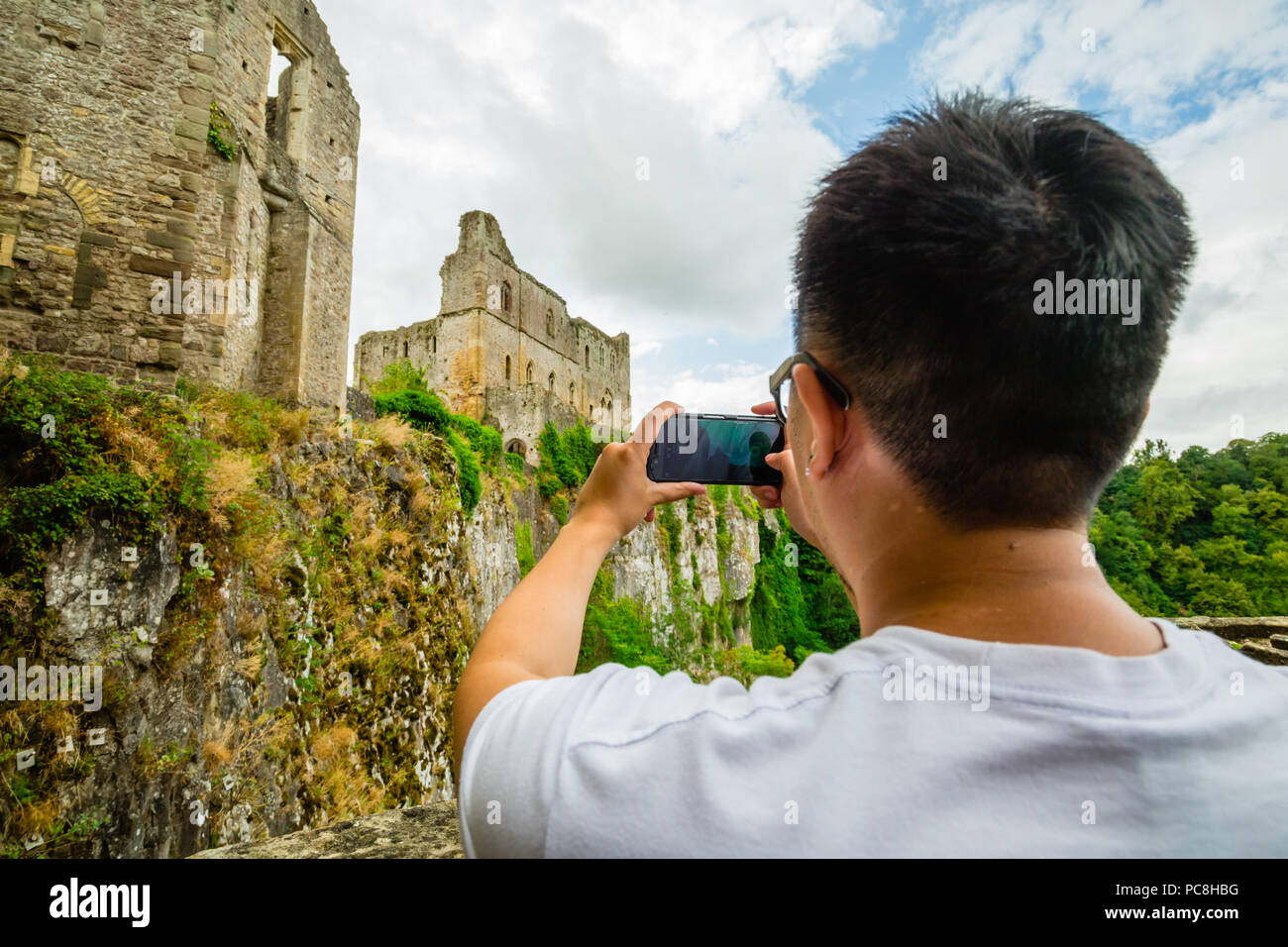 Asian tourist visiting The oldest surviving post-Roman stone ...