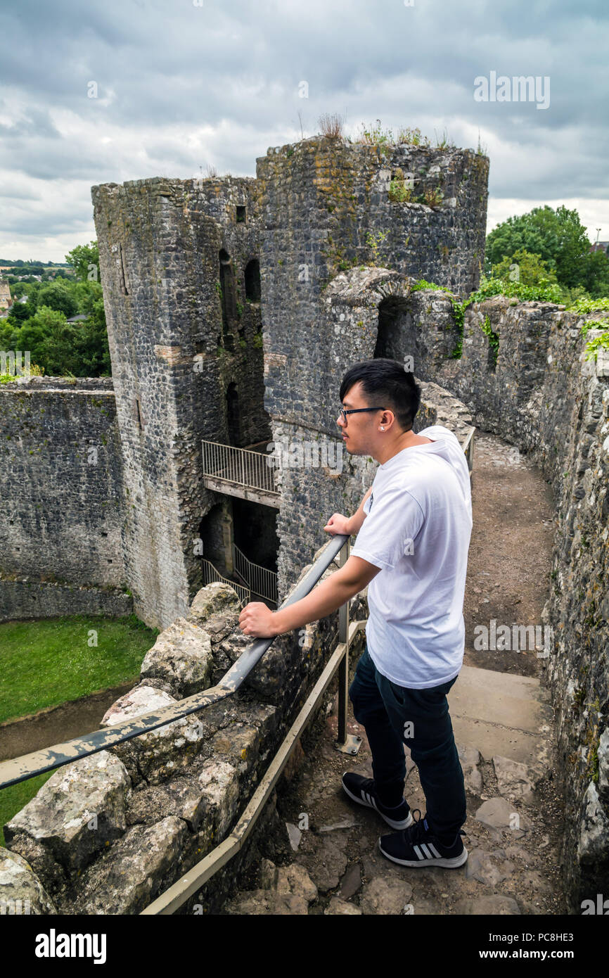 Asian tourist traveling at the oldest surviving post-Roman stone ...