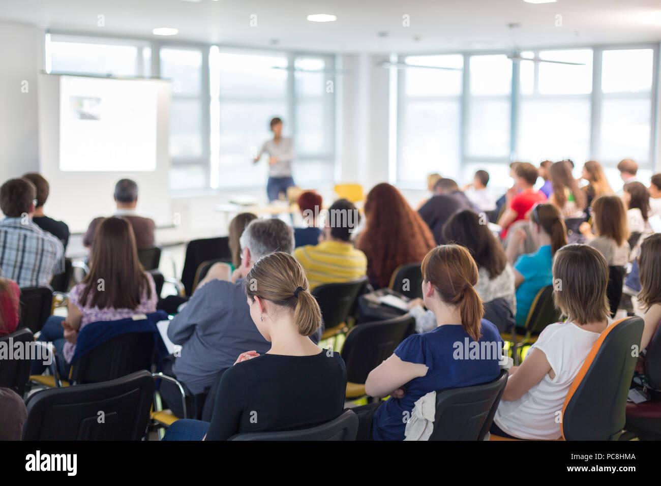 Speaker giving presentation on business conference Stock Photo - Alamy