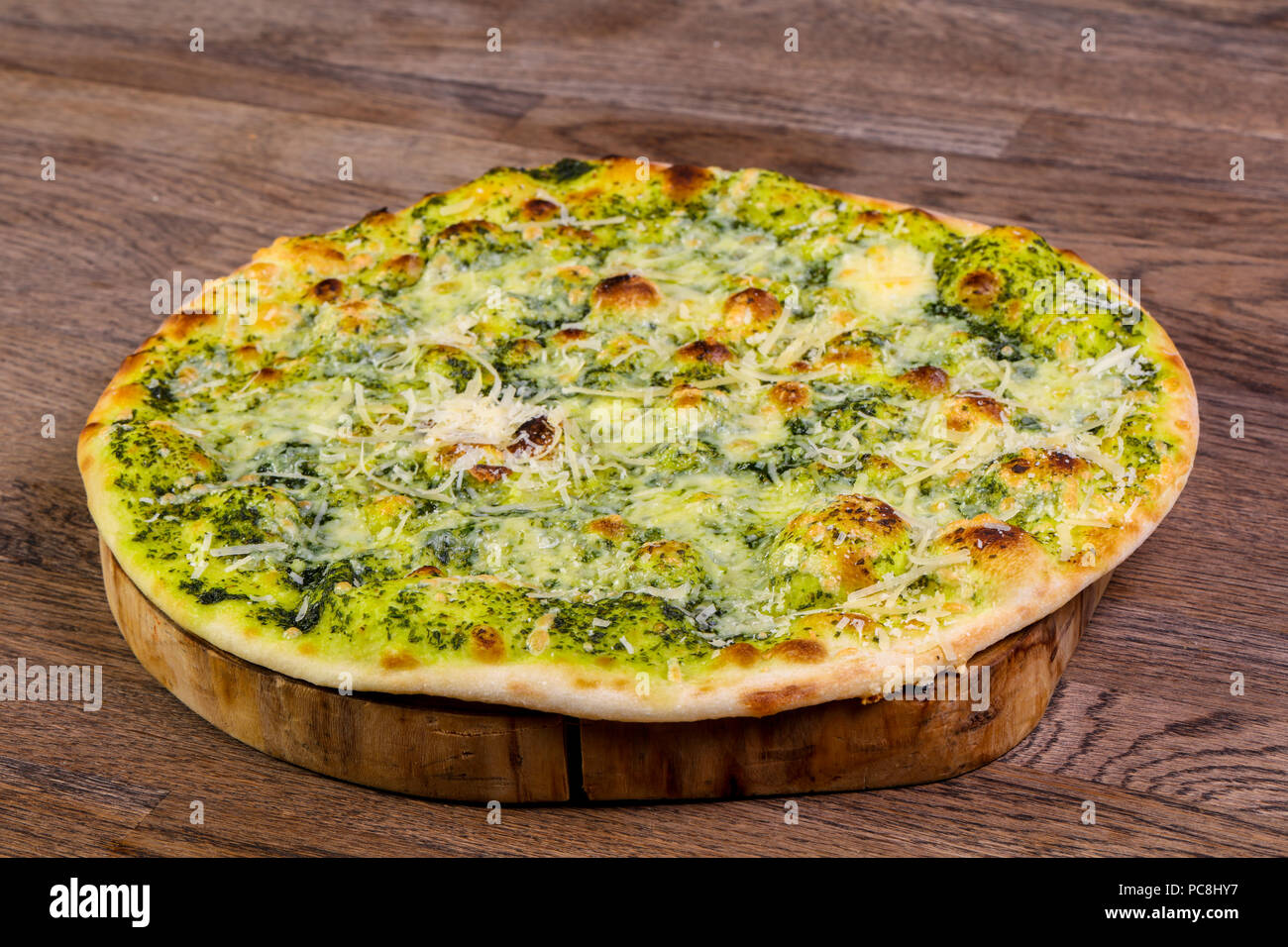 Pizza with pesto and cheese Stock Photo - Alamy